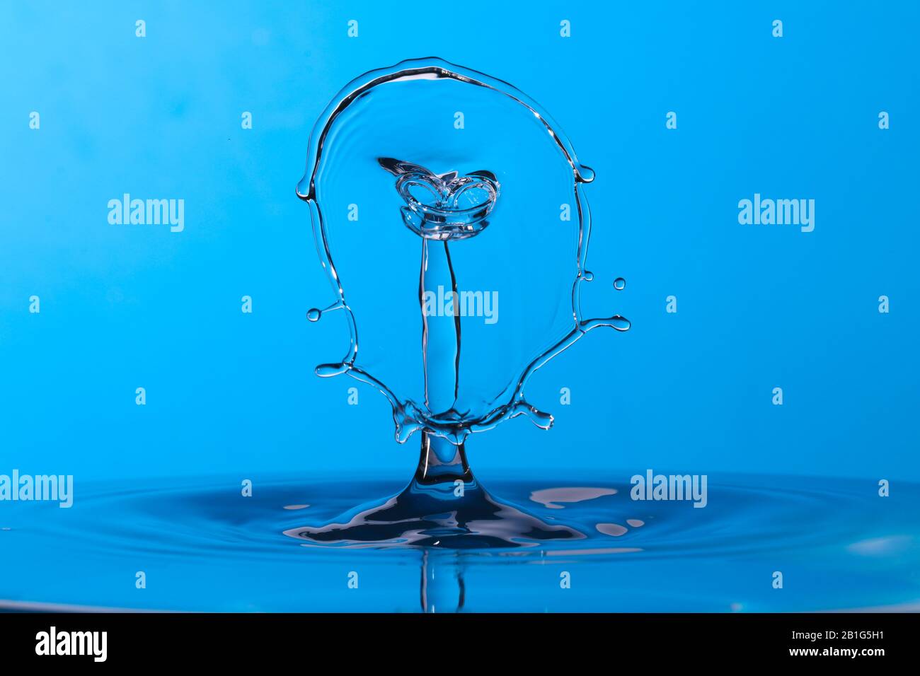 Abstract photograph of a water drop collision created with two water ...