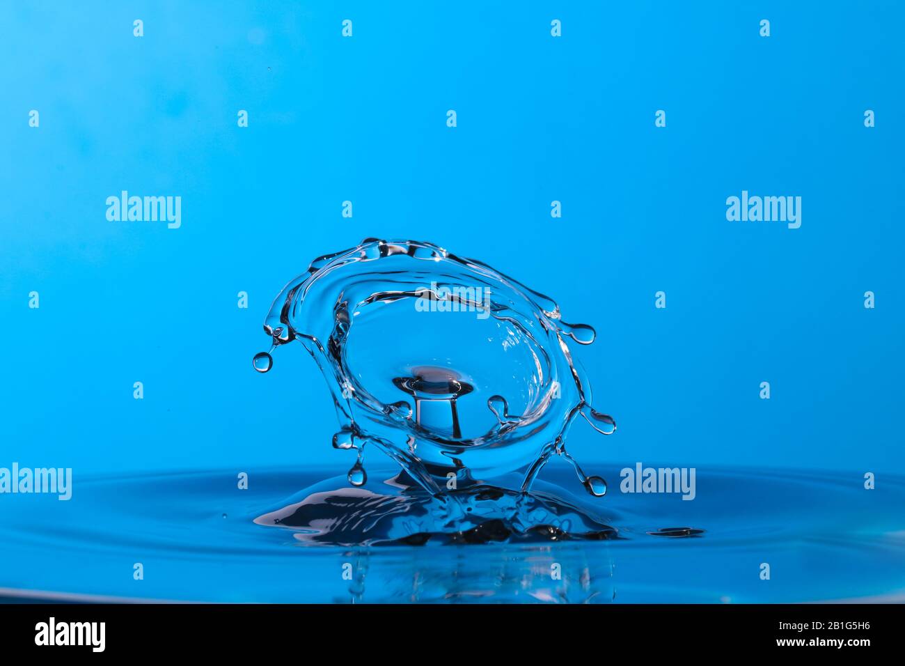 Abstract photograph of a water drop collision created with two water ...