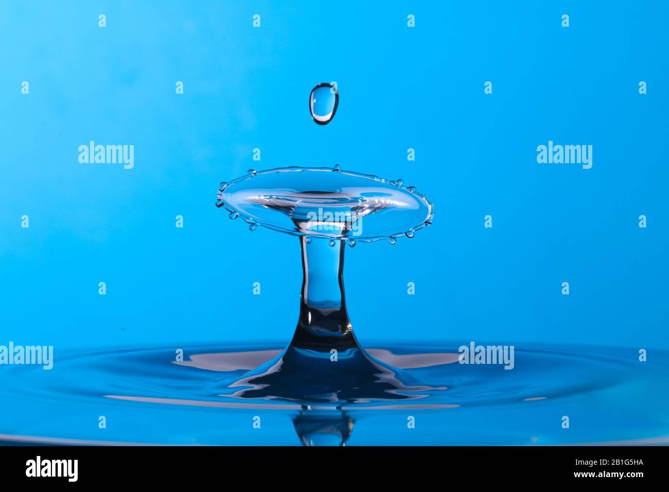 Abstract photograph of a water drop collision created with two water ...