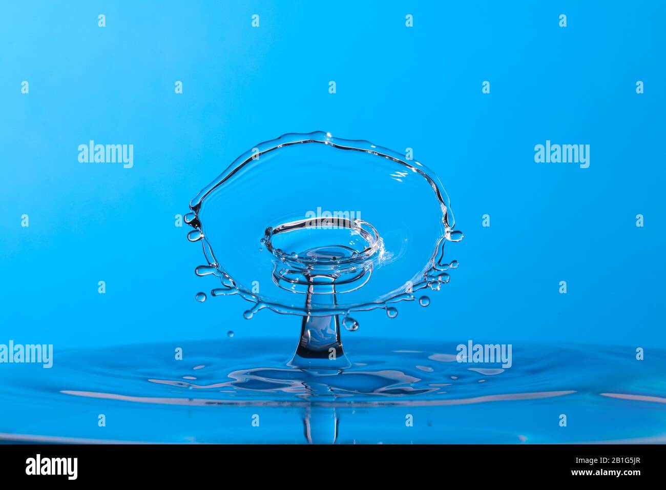 Abstract photograph of a water drop collision created with two water ...