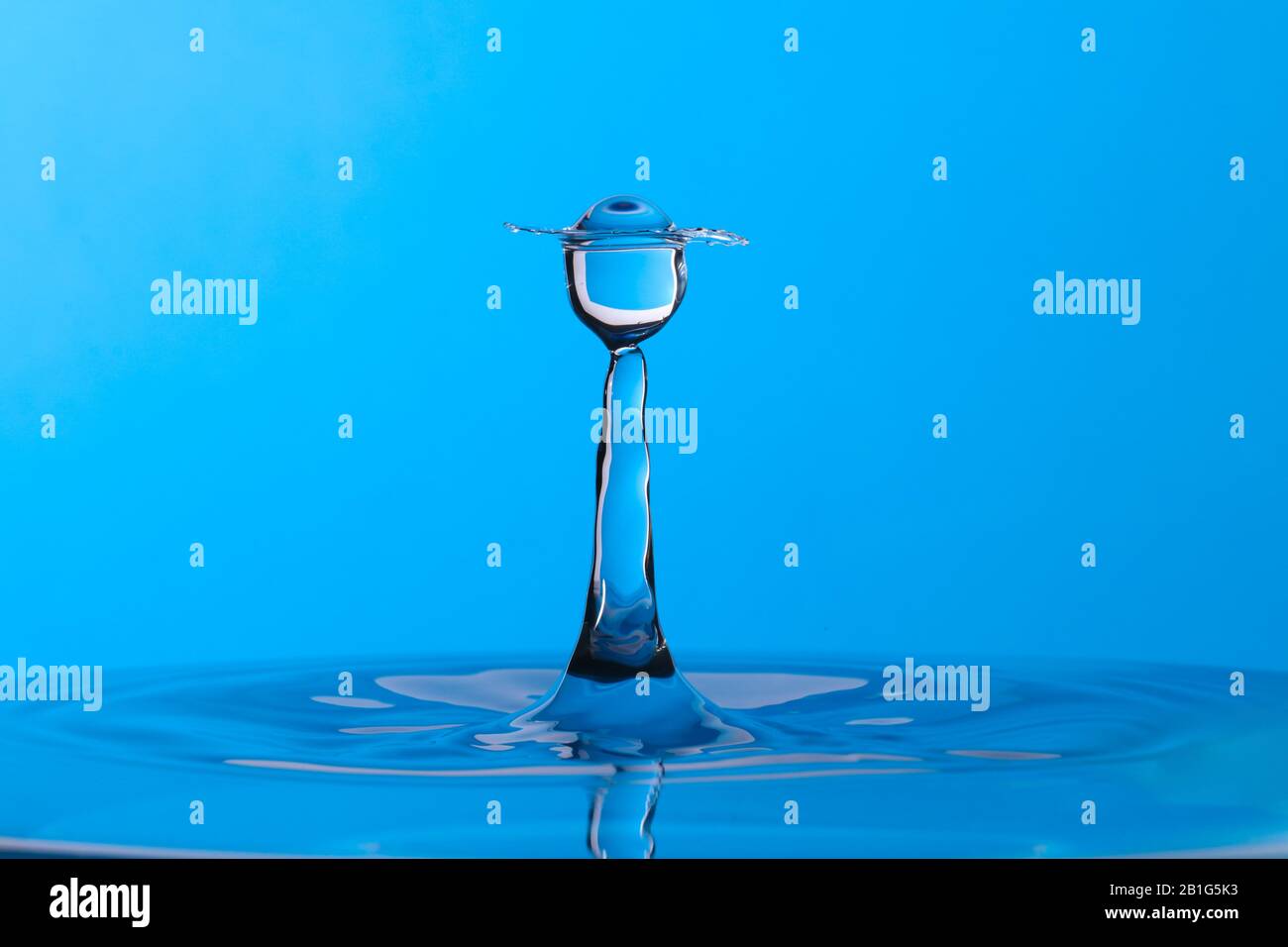 Abstract photograph of a water drop collision created with two water ...