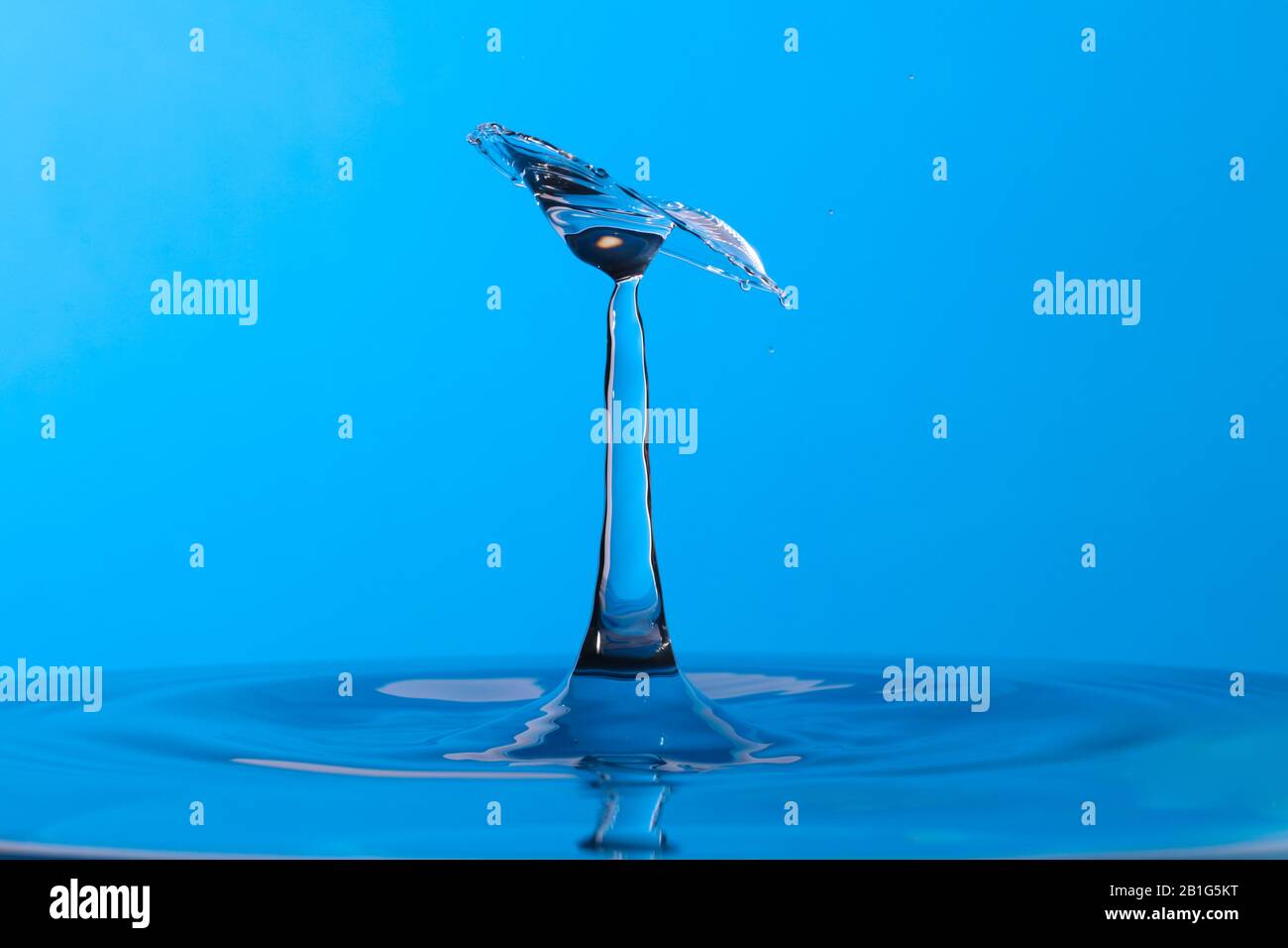 Abstract photograph of a water drop collision created with two water ...