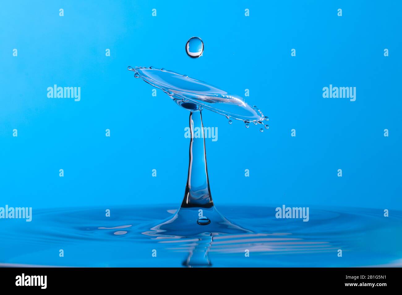 Abstract photograph of a water drop collision created with two water ...