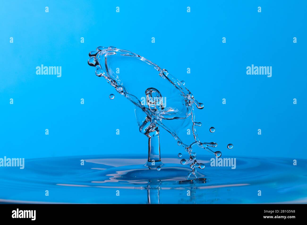 Abstract photograph of a water drop collision created with two water ...