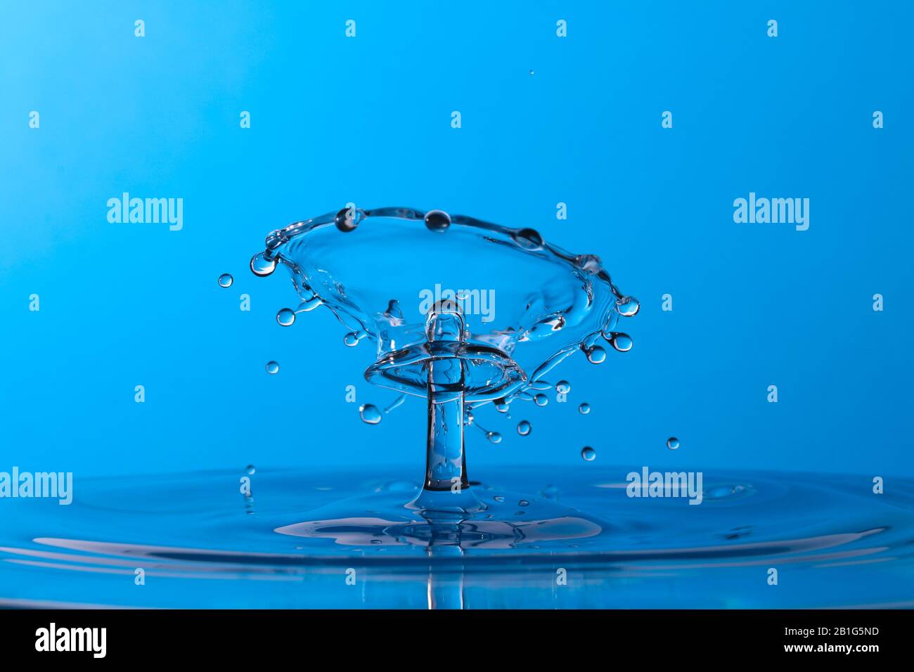 Abstract photograph of a water drop collision created with two water ...