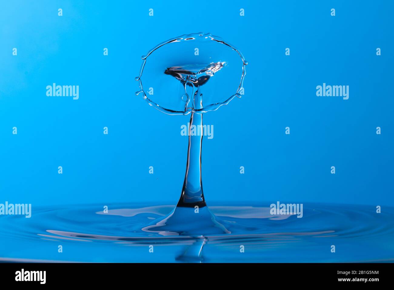 Abstract photograph of a water drop collision created with two water ...