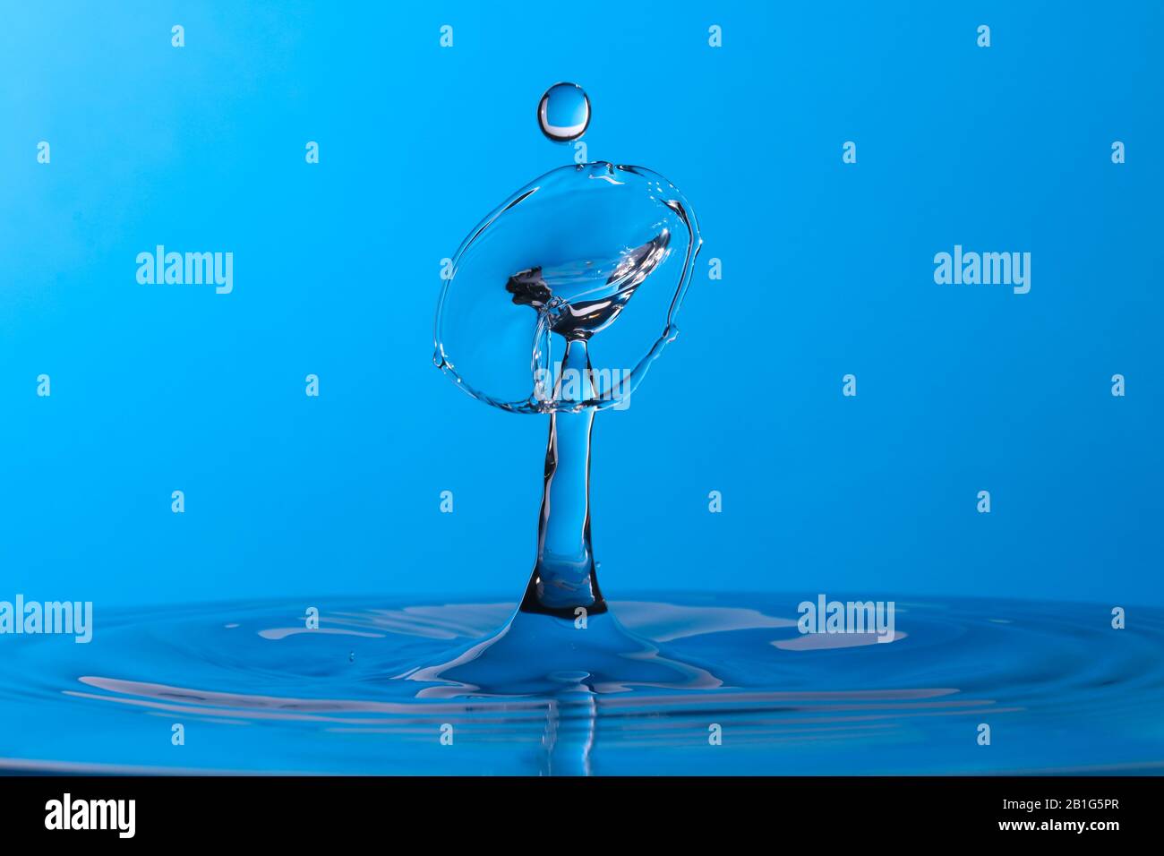 Abstract photograph of a water drop collision created with two water ...