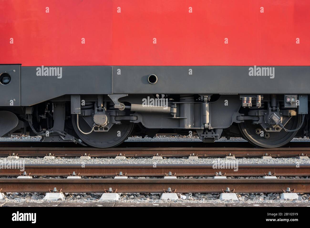 Train wheels on railroad tracks. Close-up of train locomotive bottom ...