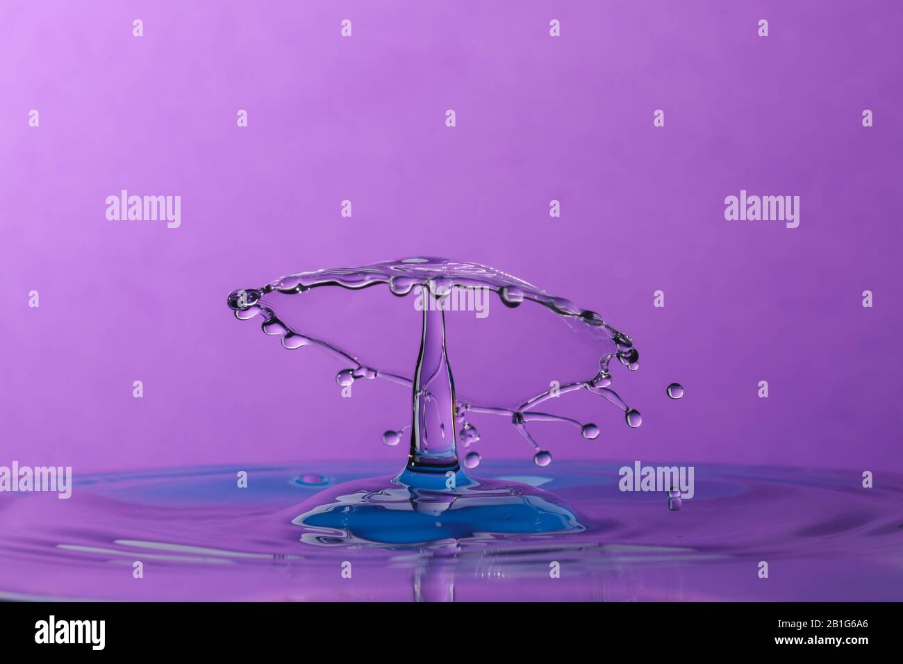 Abstract photograph of a water drop collision created with two water ...