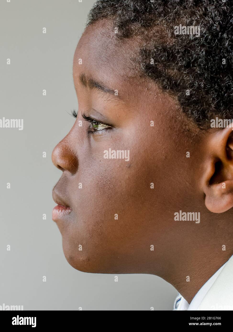 Profile portrait of black child Stock Photo - Alamy