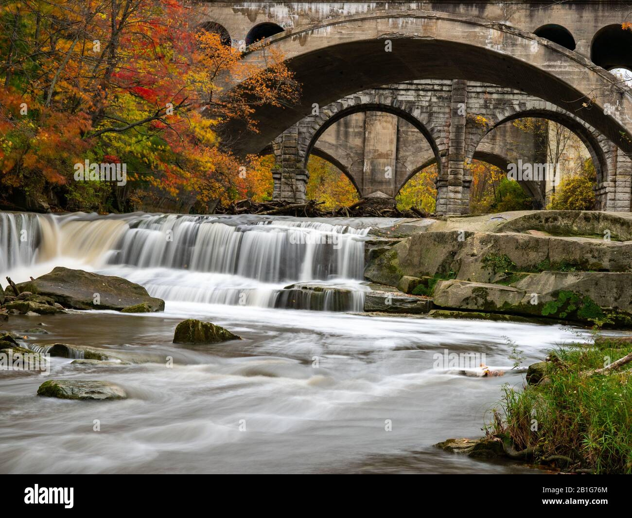 small waterfalls with arched bridges Stock Photo - Alamy