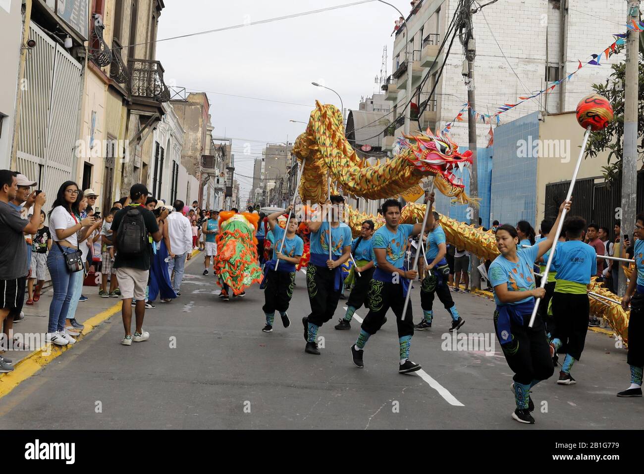 Lima, Peru. 23rd Feb, 2020. Dragon dancers perform during a parade to ...