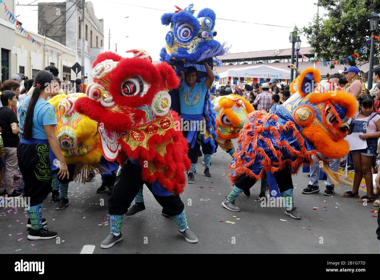 Lima, Peru. 23rd Feb, 2020. Lion dancers perform during a parade to ...
