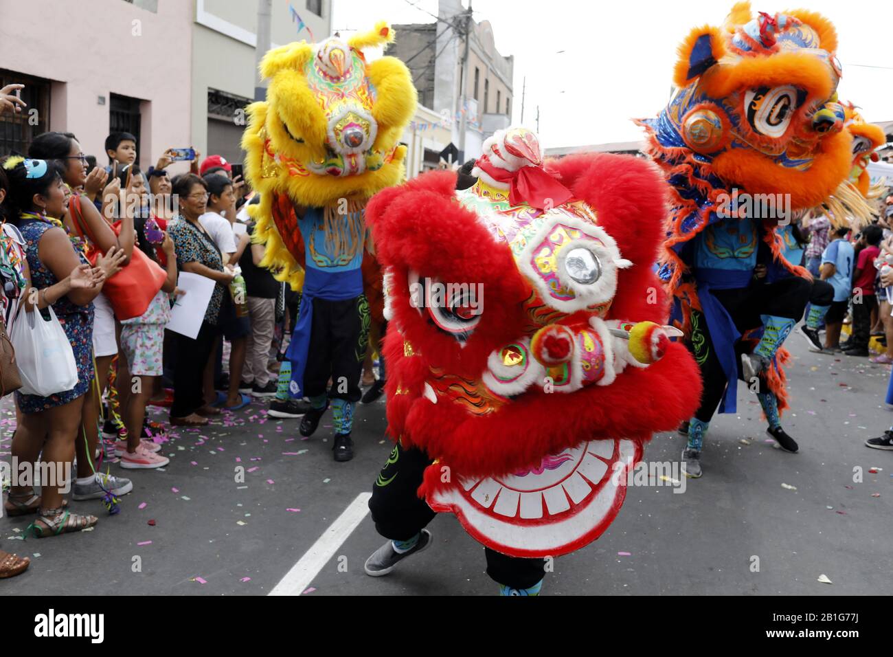Lima, Peru. 23rd Feb, 2020. Lion dancers perform during a parade to ...