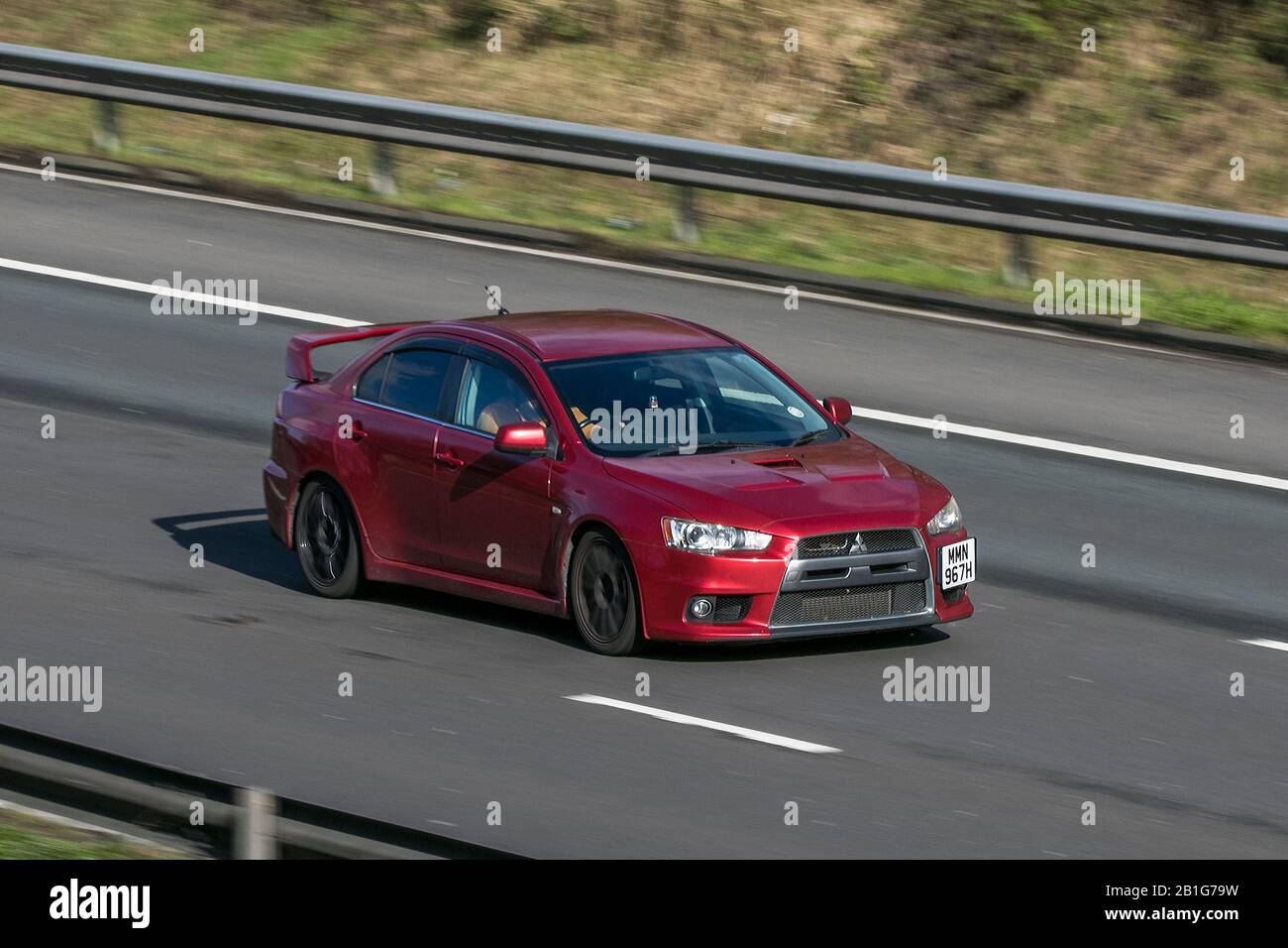 Red mitsubishi sports with spoiler hi-res stock photography and images ...