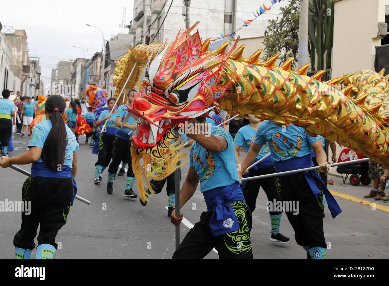 Lima, Peru. 23rd Feb, 2020. Dragon dancers perform during a parade to ...