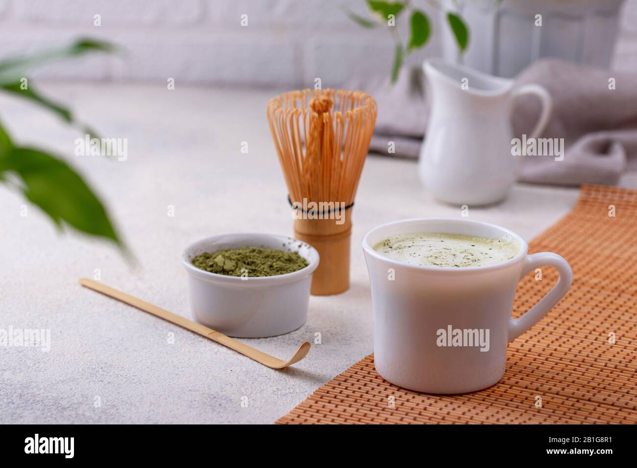 Green healthy matcha latte drink Stock Photo - Alamy