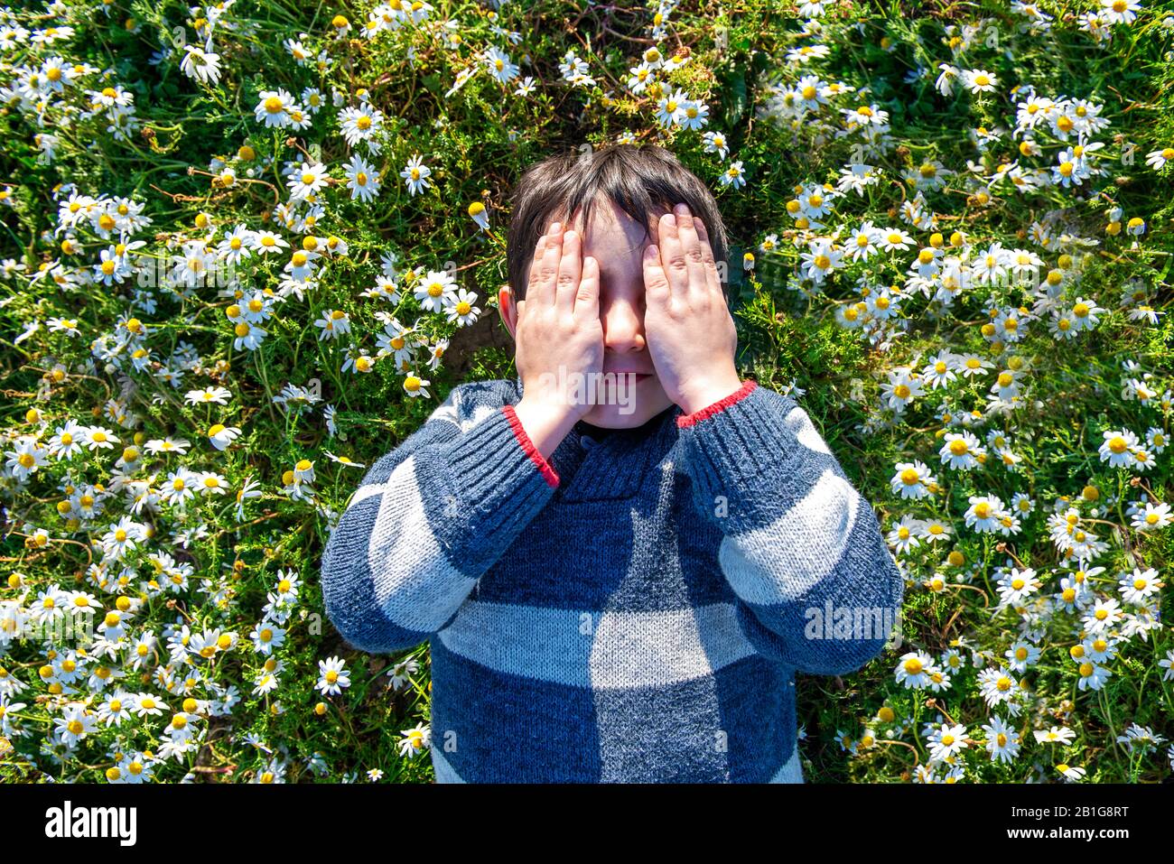 Child eyes shut in nature hi-res stock photography and images - Alamy