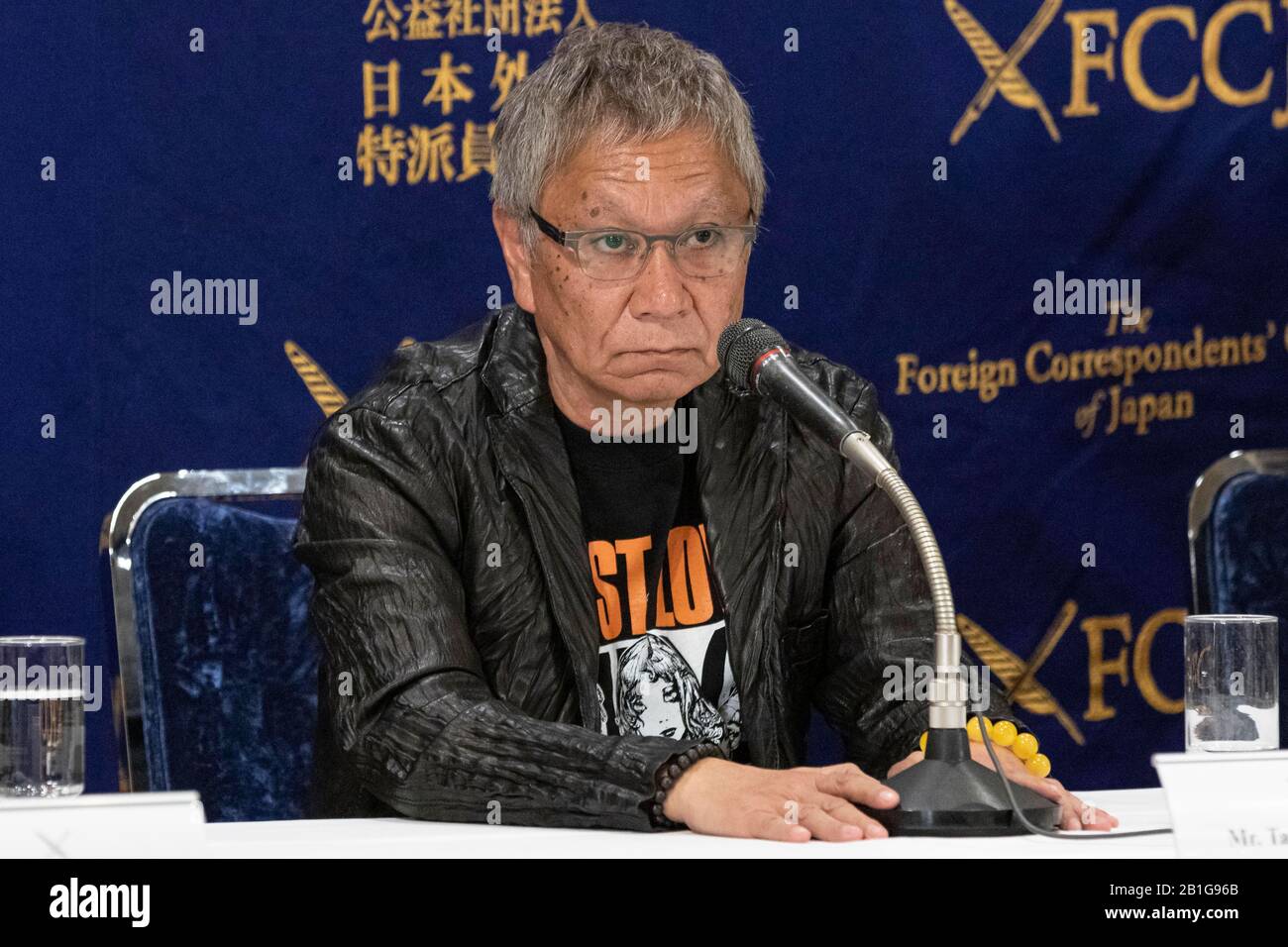 Japanese director Takashi Miike attends a Q&A after ended a sneak ...