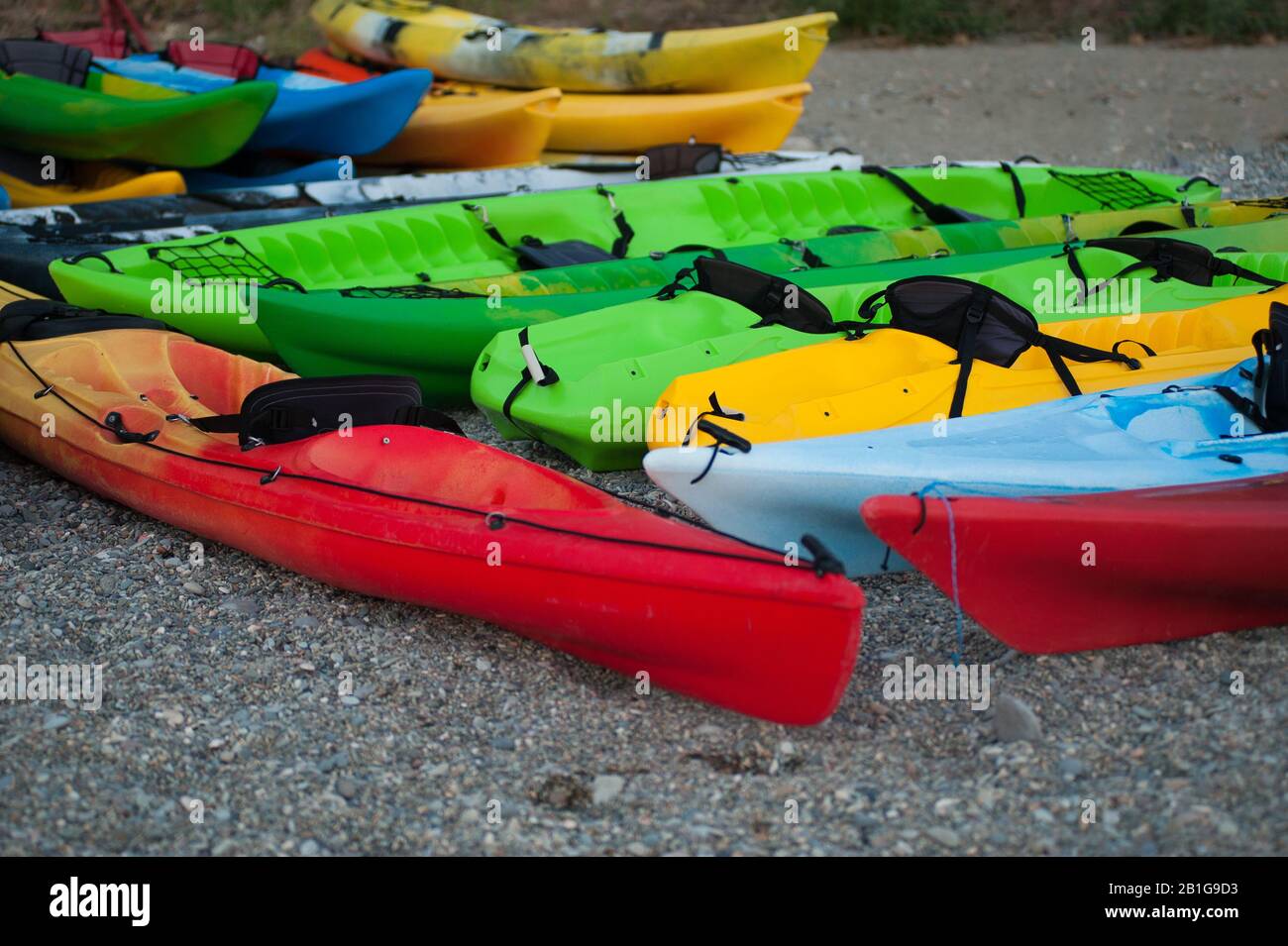 Colourful kayaks on the beach. Vacation Stock Photo - Alamy