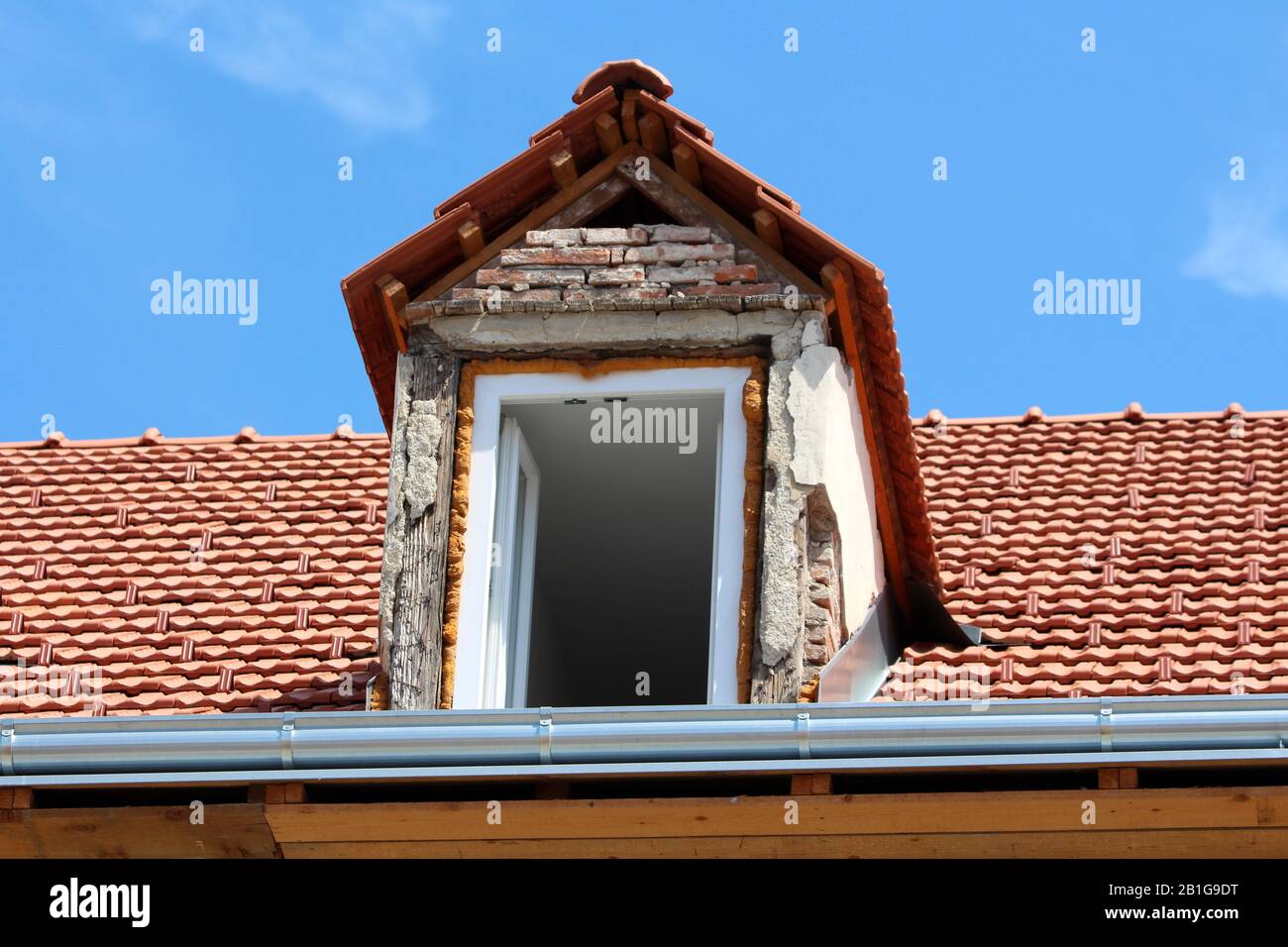 Reconstruction of old dilapidated roof window with already installed ...