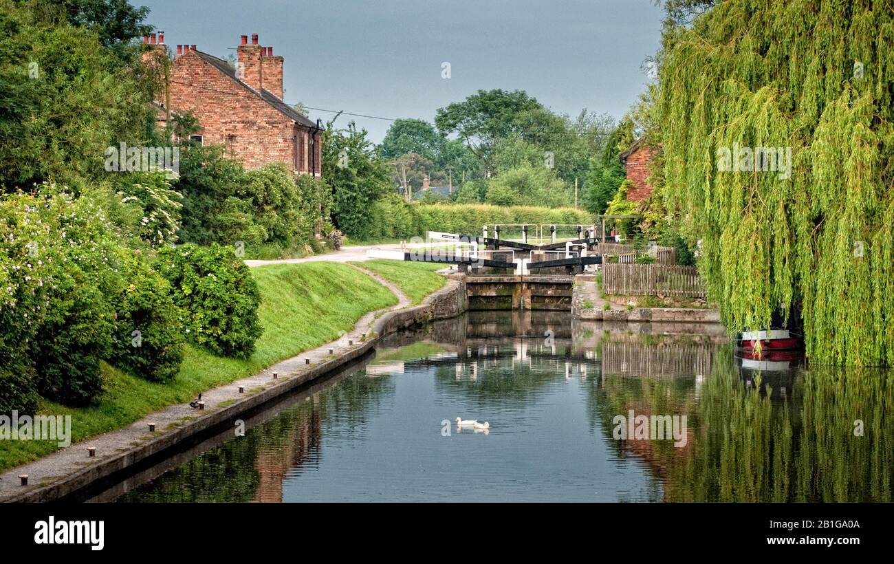 Reflections on the canal at Shardlow Lock on the Trent and Mersey Canal ...