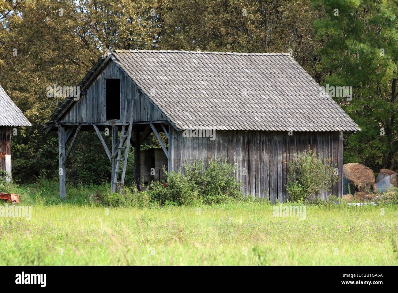 Vintage retro rustic old dilapidated wooden barn made from wooden ...