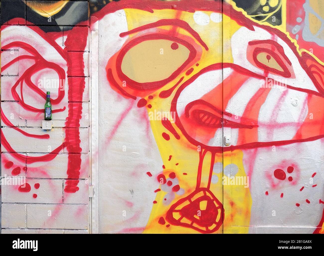 Modern graffiti in Porta Garibaldi distrect of Milan, Italy, depicting ...