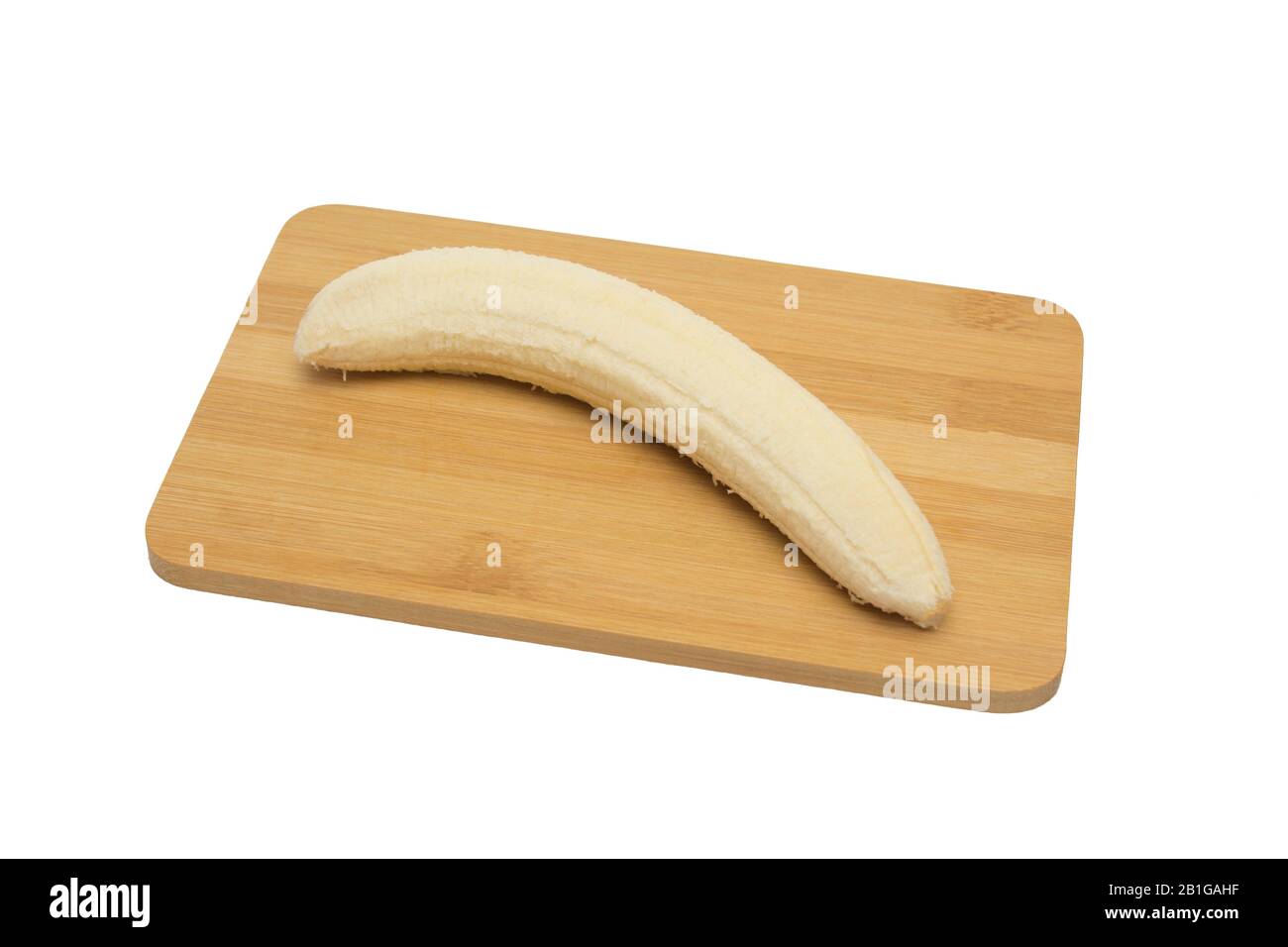 Cutting banana on white board hi-res stock photography and images - Alamy