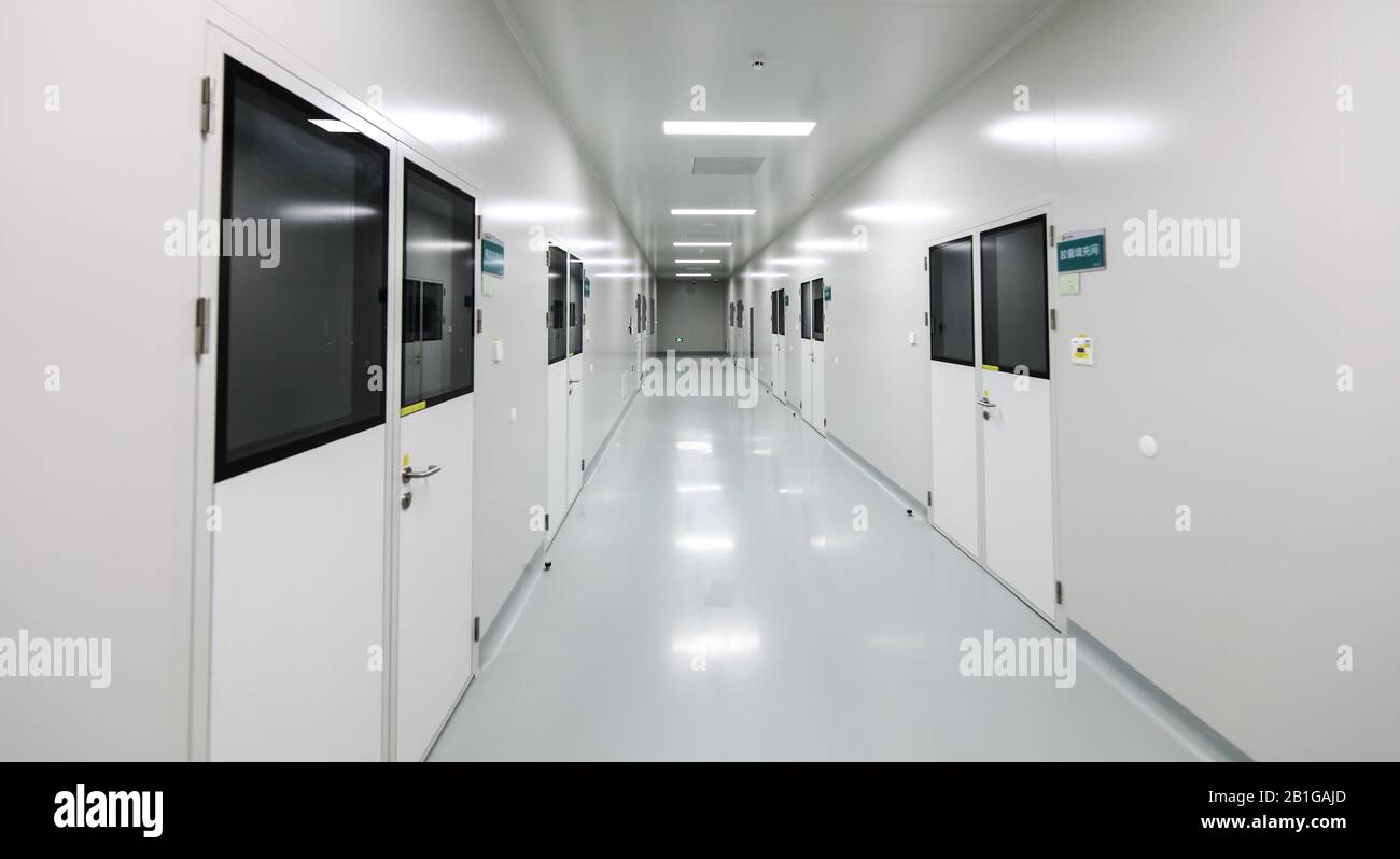 White clean empty tunnel corridor of laboratory Stock Photo - Alamy