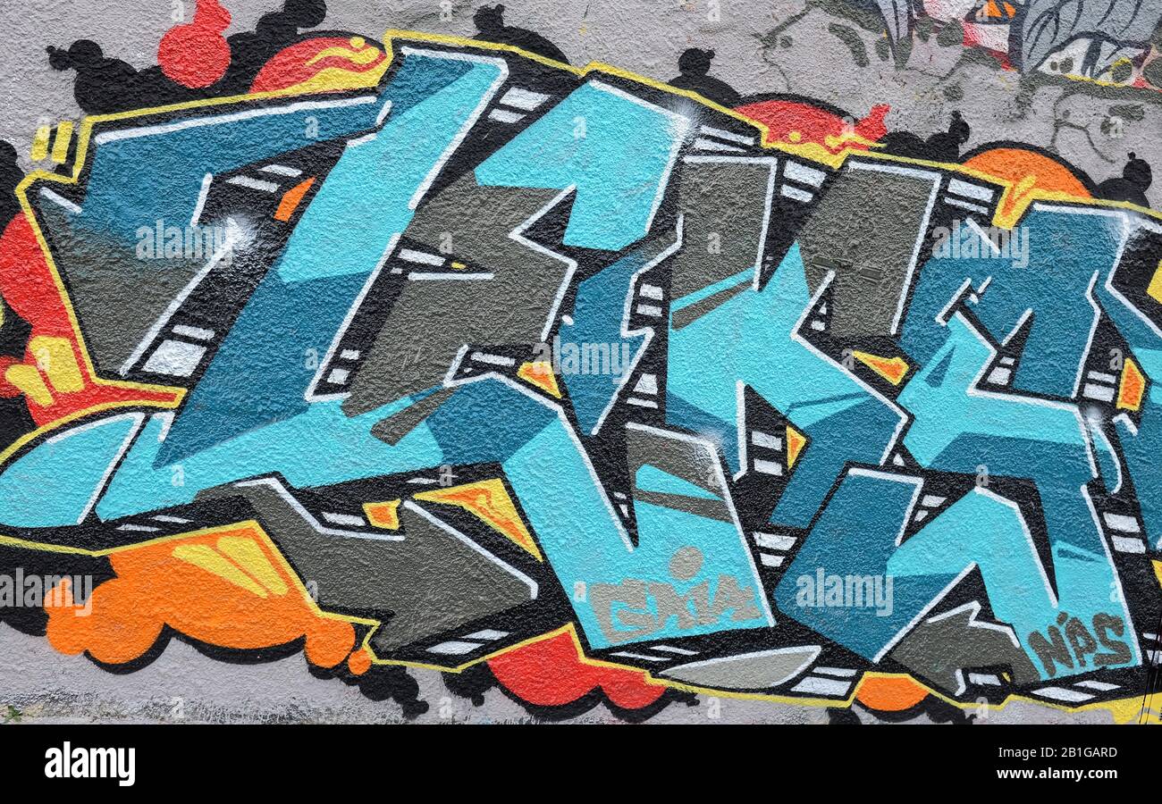 Modern graffiti in Porta Garibaldi distrect of Milan, Italy, depicting ...