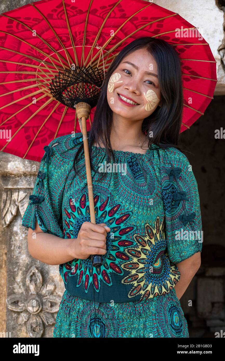 Beautiful young Burmese woman posing for photos at Maha Sandar Mahi Pagoda, Amarapura, Mandalay ...
