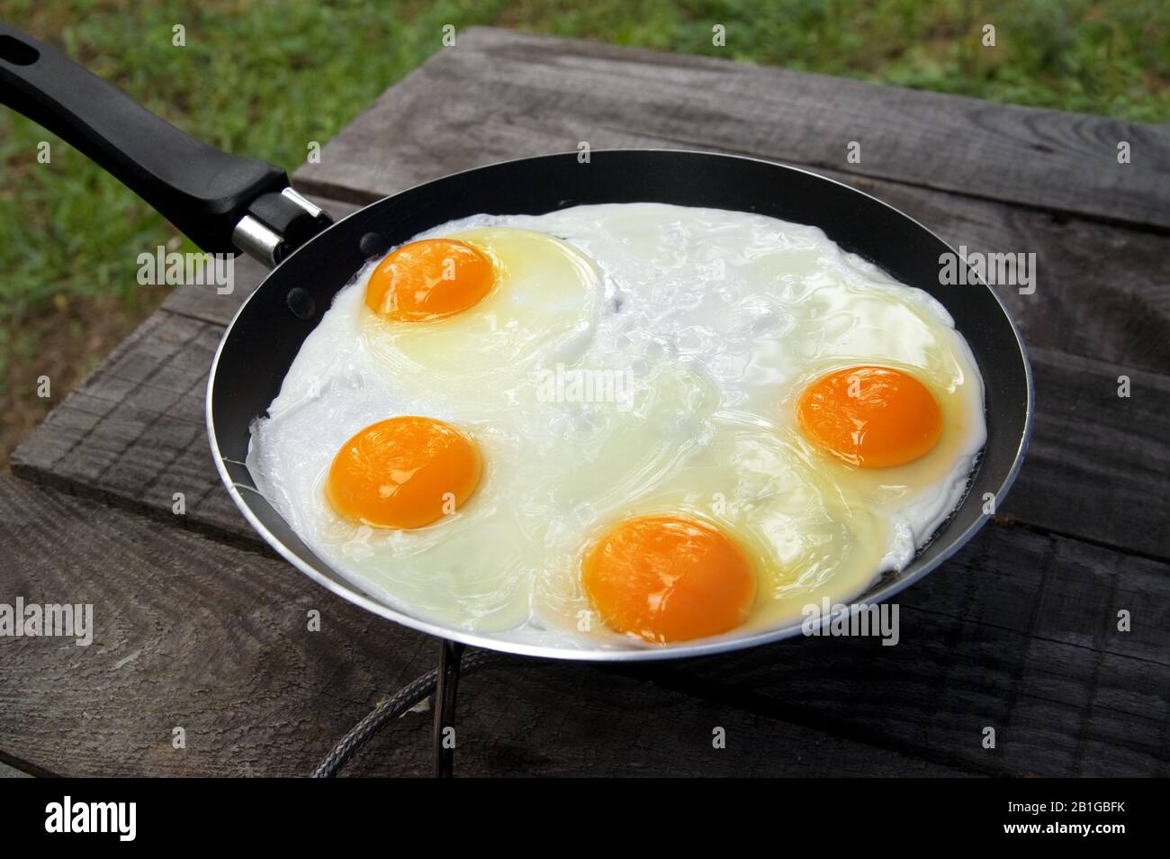 Sunny side up wood fire eggs hi-res stock photography and images - Alamy