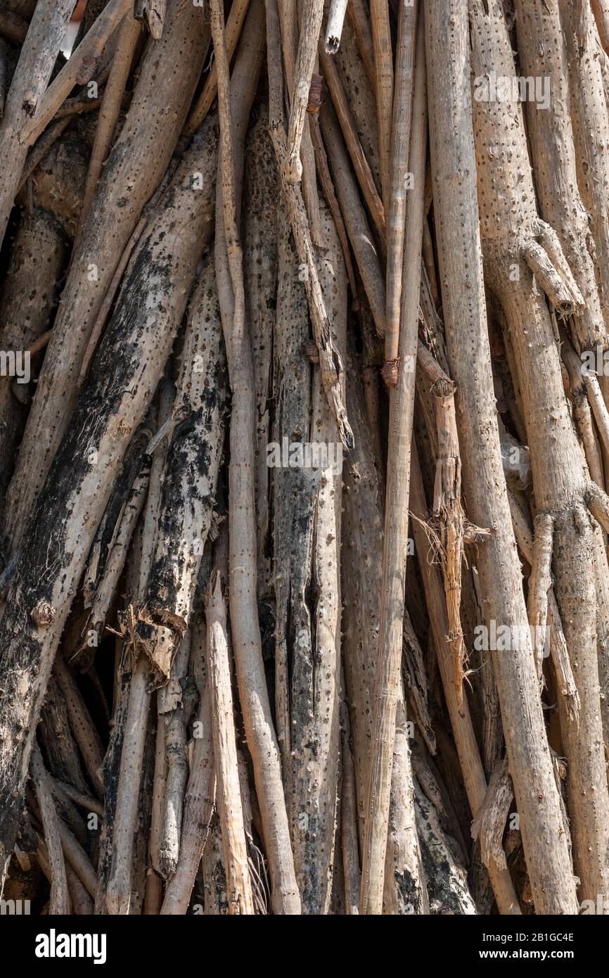 a bunch wooden of twigs and sticks kindling ready for a real fire in a ...