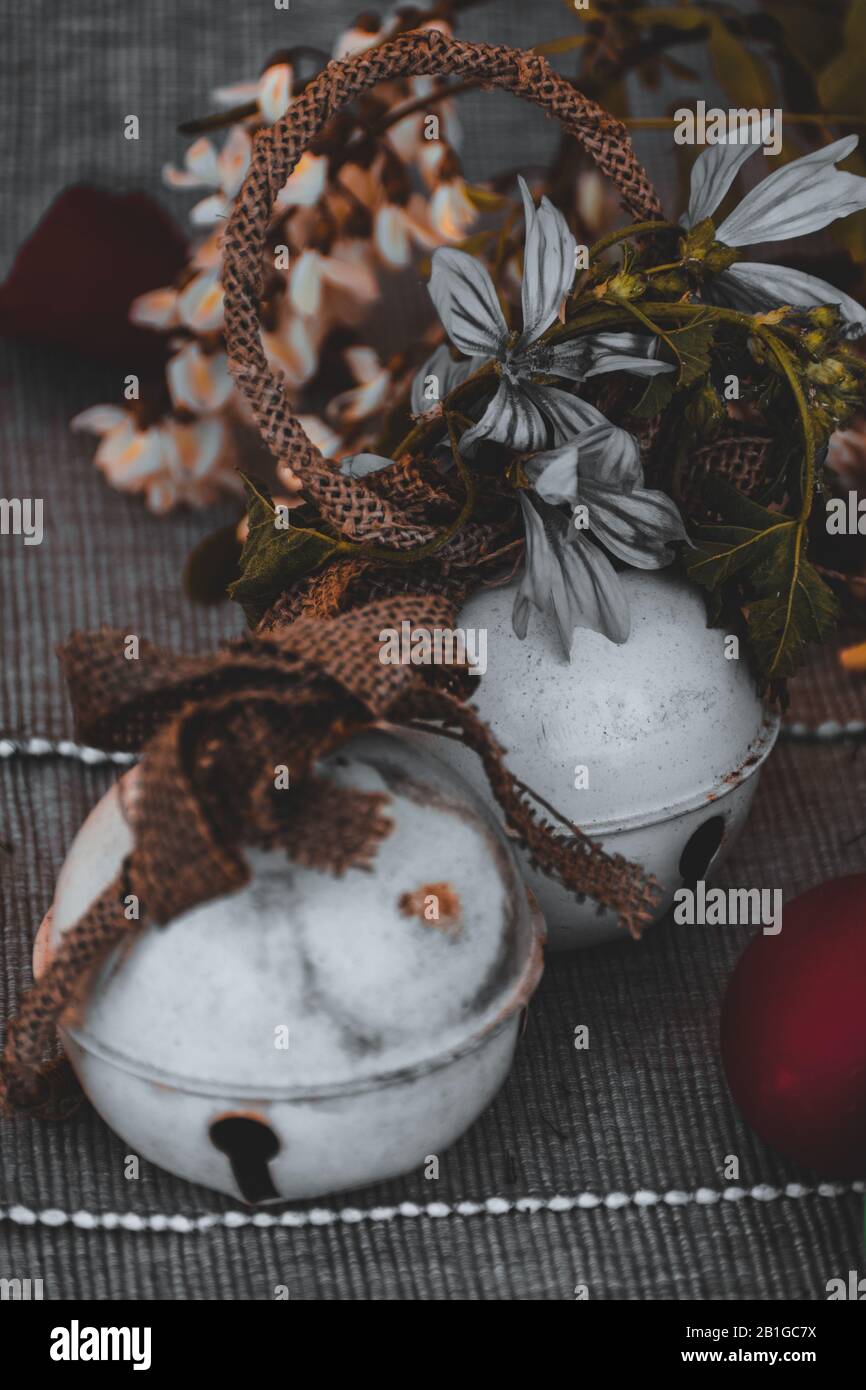 Two white bells between an easter red egg and spring flowers Stock ...