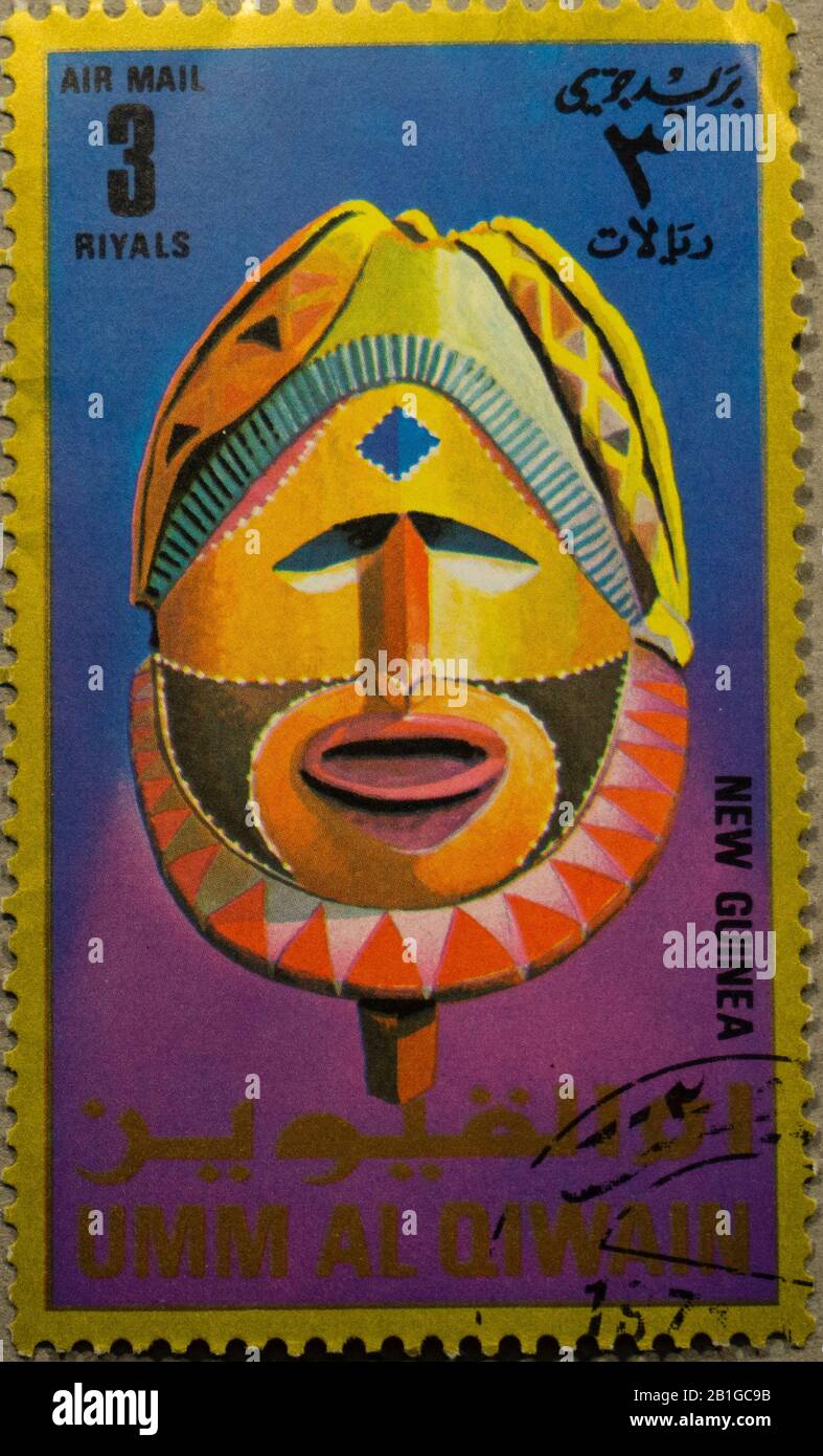 New Guinea dancer mask postal stamp Stock Photo - Alamy