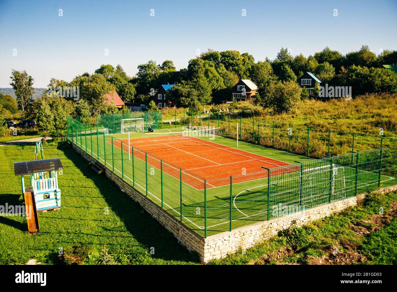 Basketball field covered grass hi-res stock photography and images - Alamy
