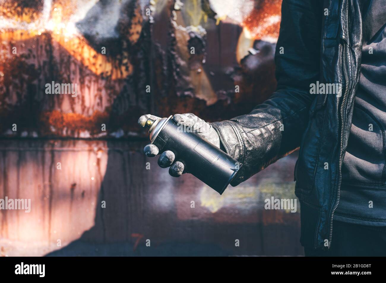 Aerosol can in hand hi-res stock photography and images - Alamy