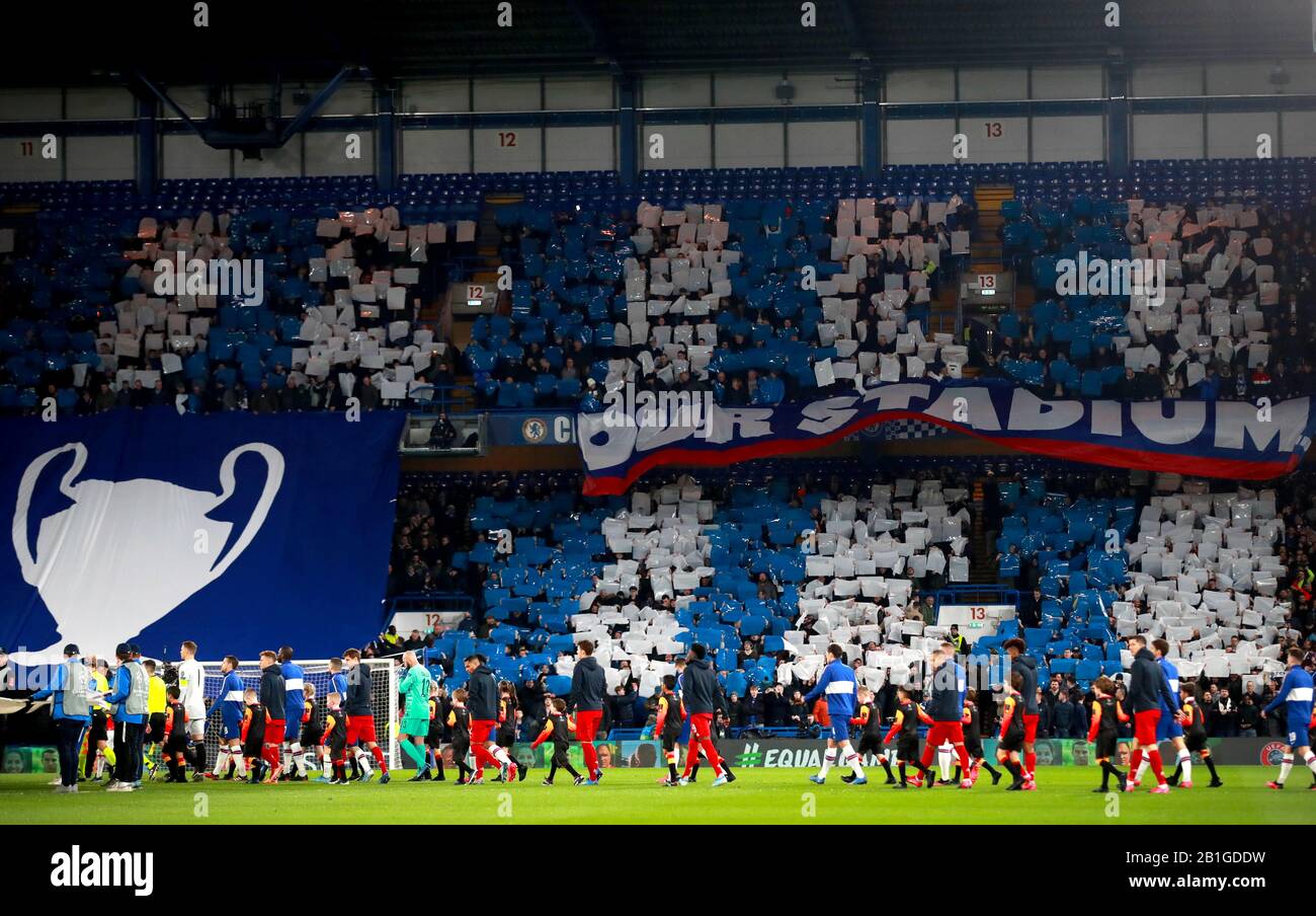 Players and mascots walk out onto the pitch ahead of the UEFA Champions ...