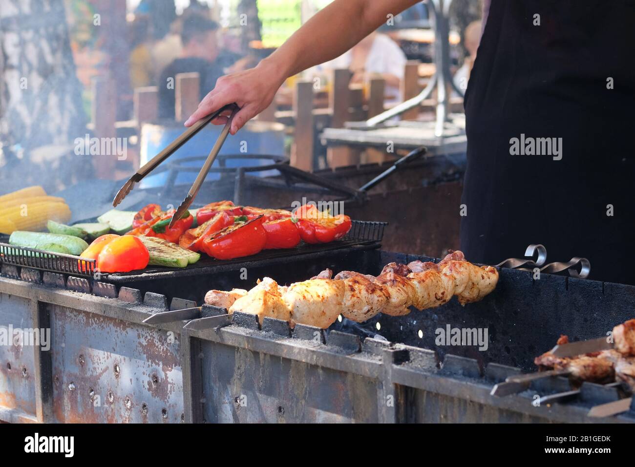 Black apron hi-res stock photography and images - Alamy