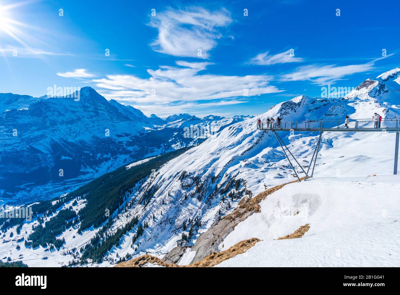 GRINDELWALD-FIRST, SWITZERLAND - JANUARY 15 2020: Tourists take photos ...