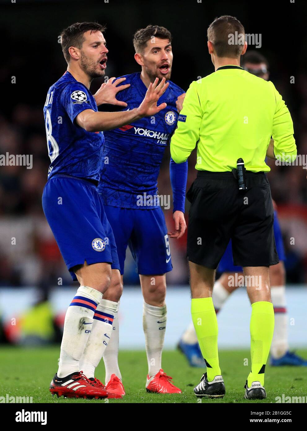 Chelsea's Jorginho (centre) is shown the yellow card by referee Clement ...