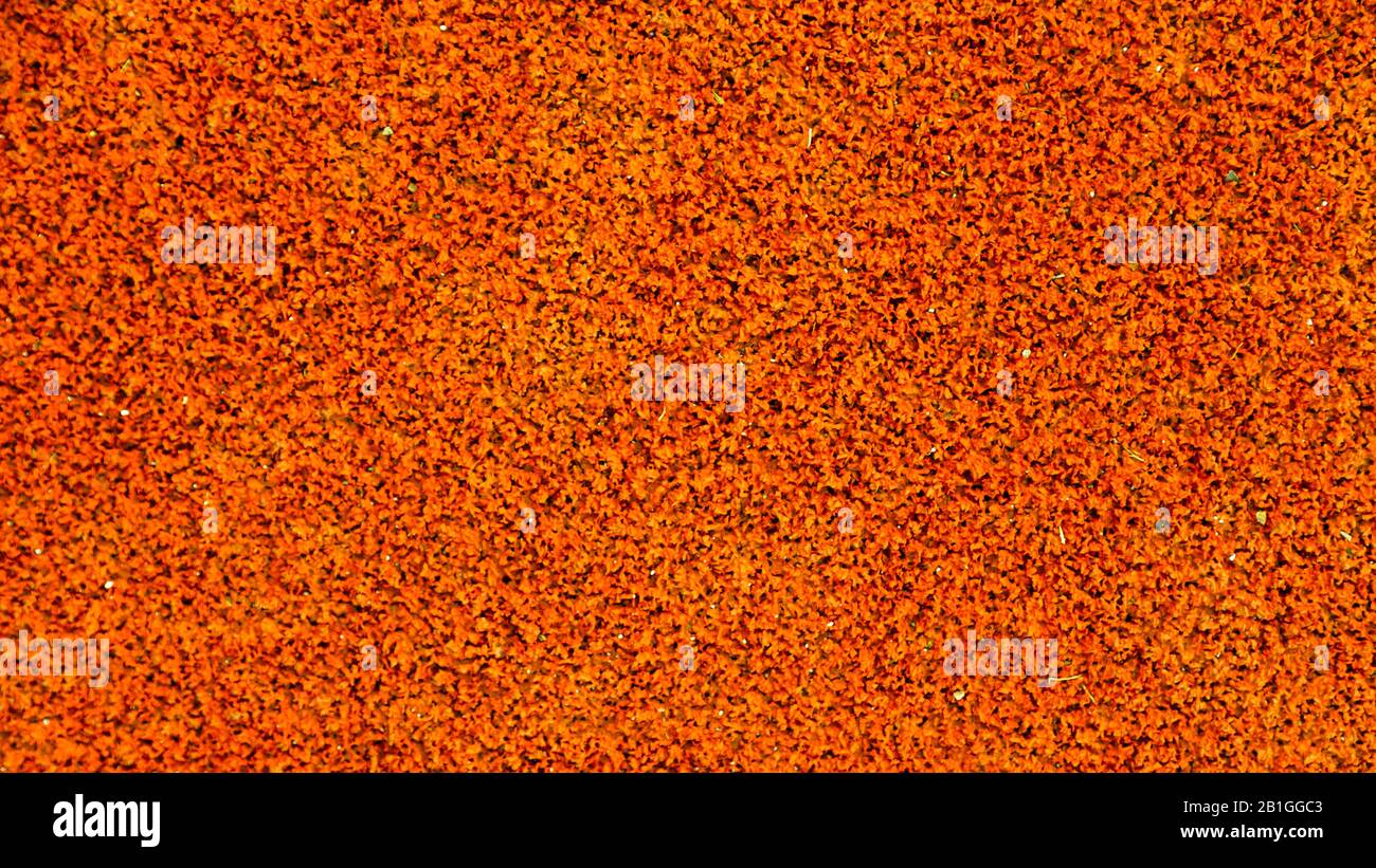 Close up orange running track background texture Stock Photo - Alamy