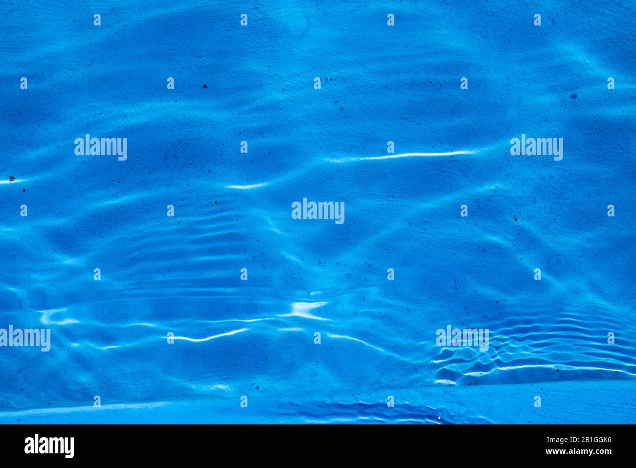 Swimming pool surface with clean blue water. Summer background. Top ...