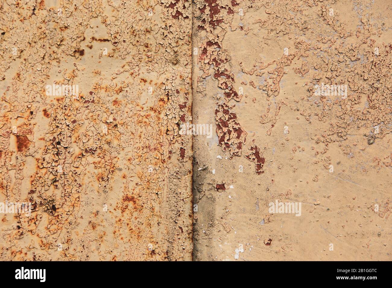 Rusty metal wall, old sheet of iron covered with rust with paint ...