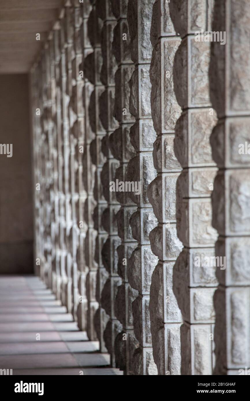 office building columns in row with nice light Stock Photo - Alamy