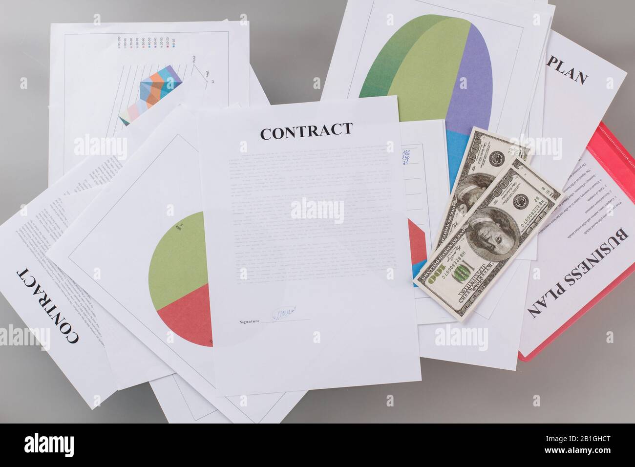 Layout with documents and dollar banknotes Stock Photo - Alamy
