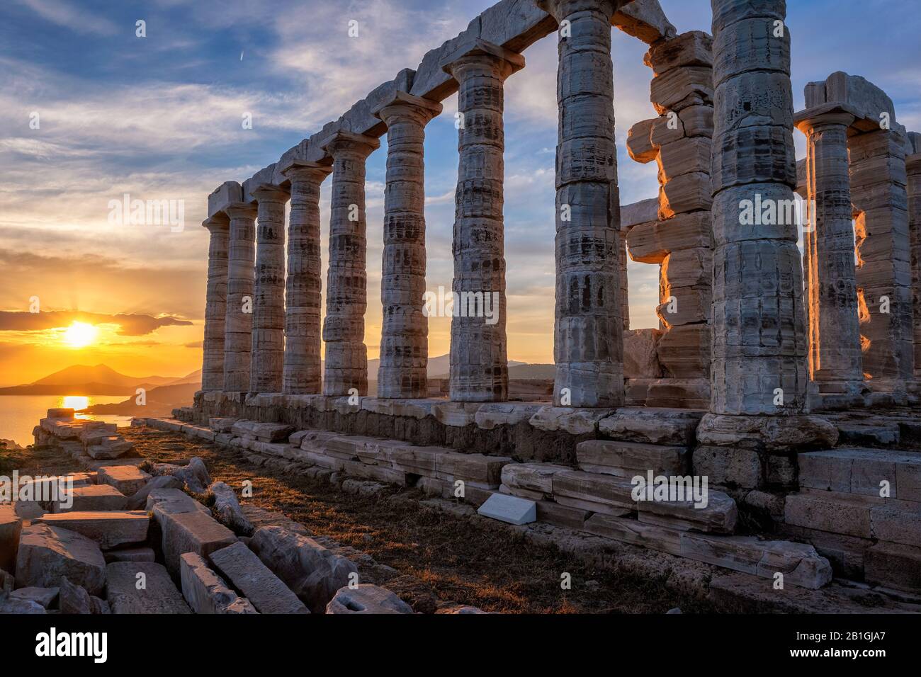 Poseidon temple ruins on Cape Sounio on sunset, Greece Stock Photo - Alamy