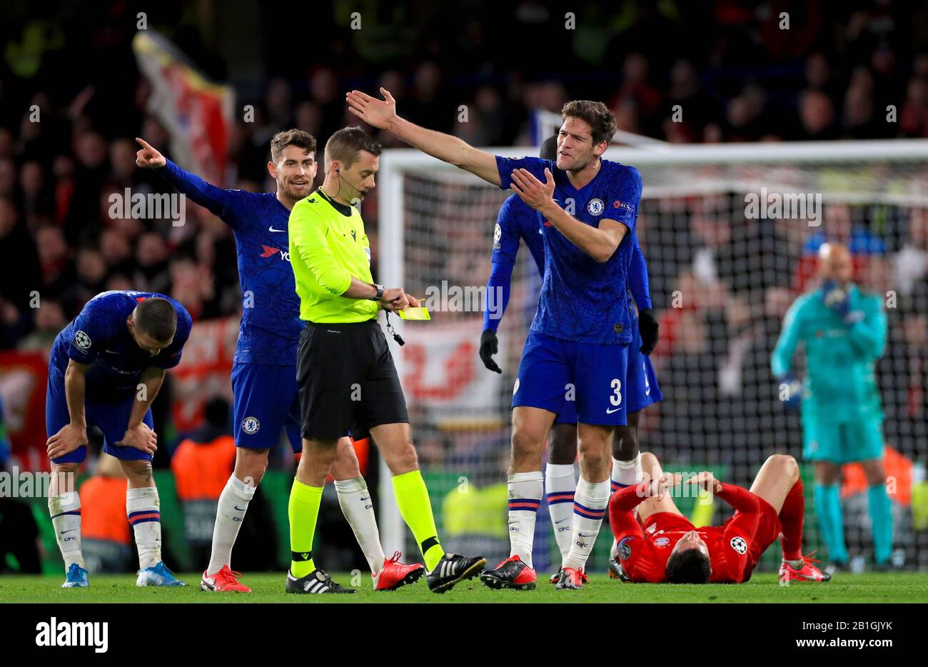 Chelsea's Marcos Alonso appeals to referee Clement Turpin atter being ...