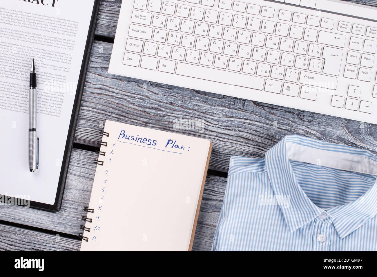 Business plan in notepad Stock Photo - Alamy